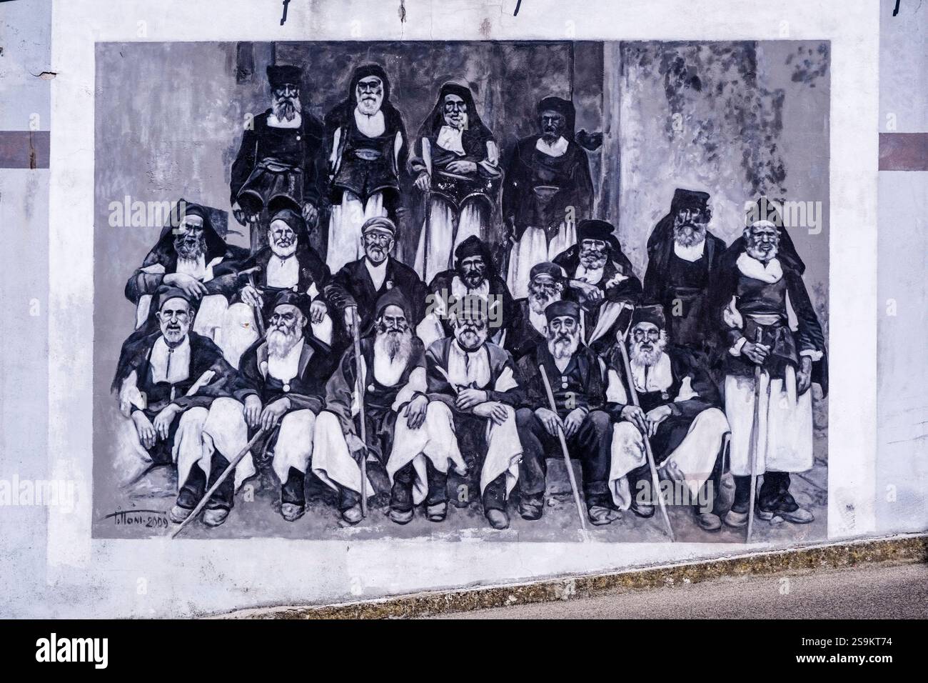 Graffiti of a group of old men in traditional Sardinian dresses ...