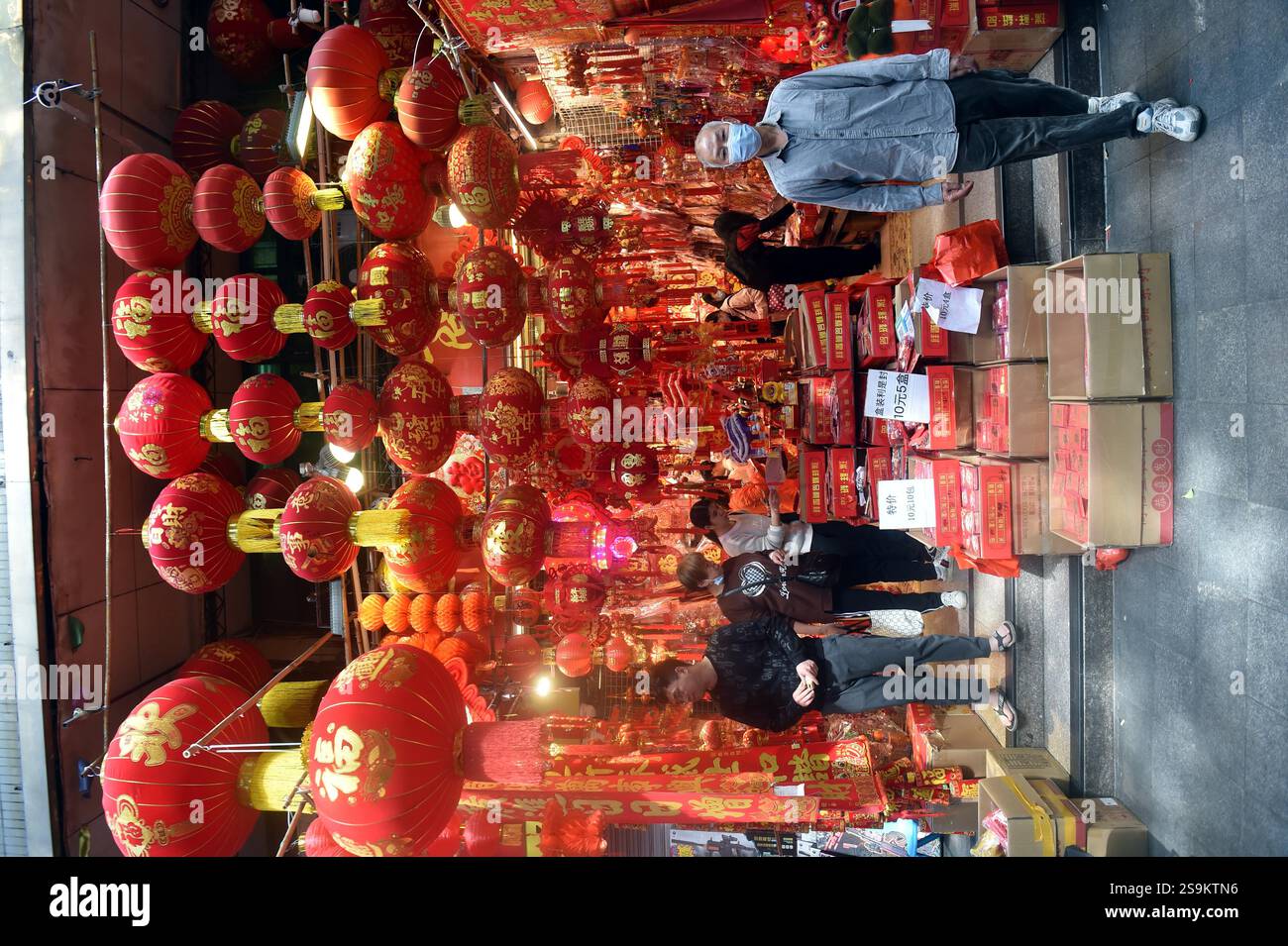 People select Spring Festival decorations in Guangzhou City, south ...