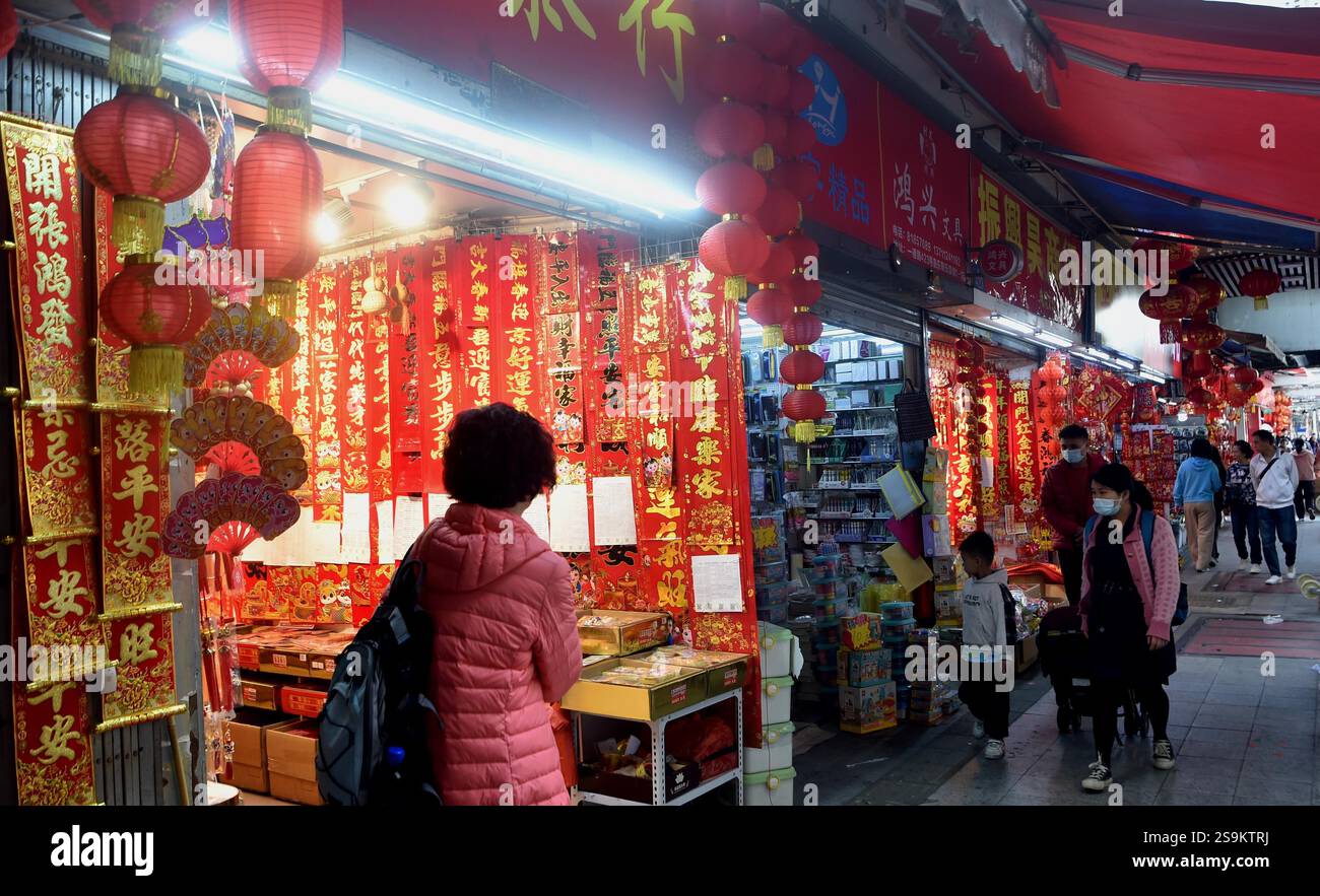 People select Spring Festival decorations in Guangzhou City, south ...