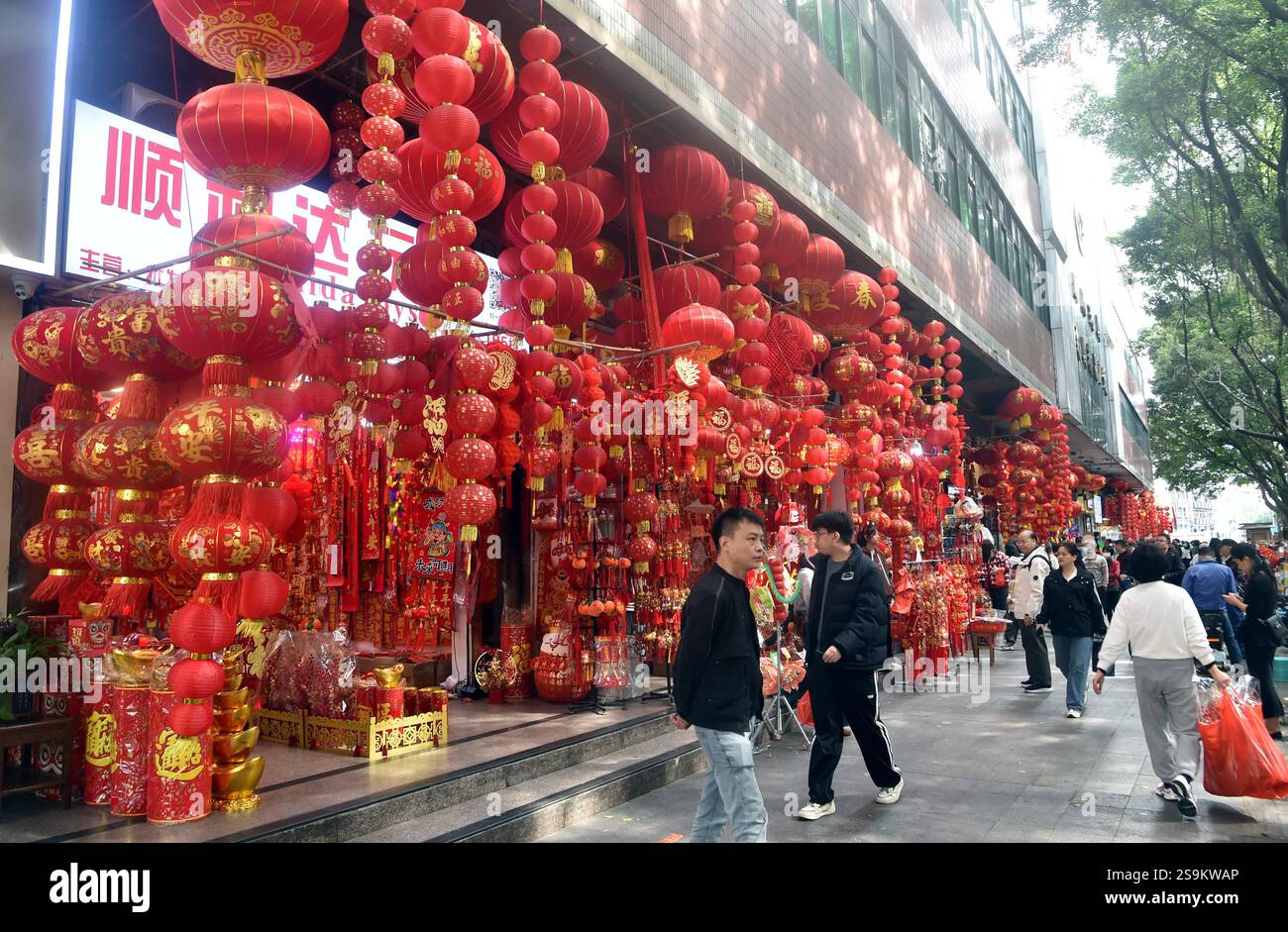 People select Spring Festival decorations in Guangzhou City, south ...