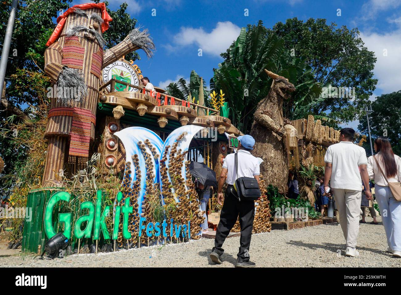 Giant Scarecrows of the Bambanti Festival Visitors observe giant ...