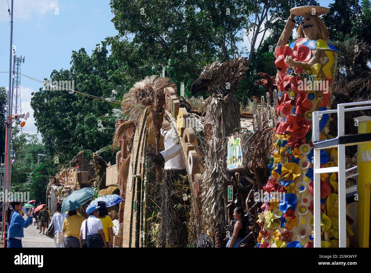 Giant Scarecrows of the Bambanti Festival Visitors observe giant ...