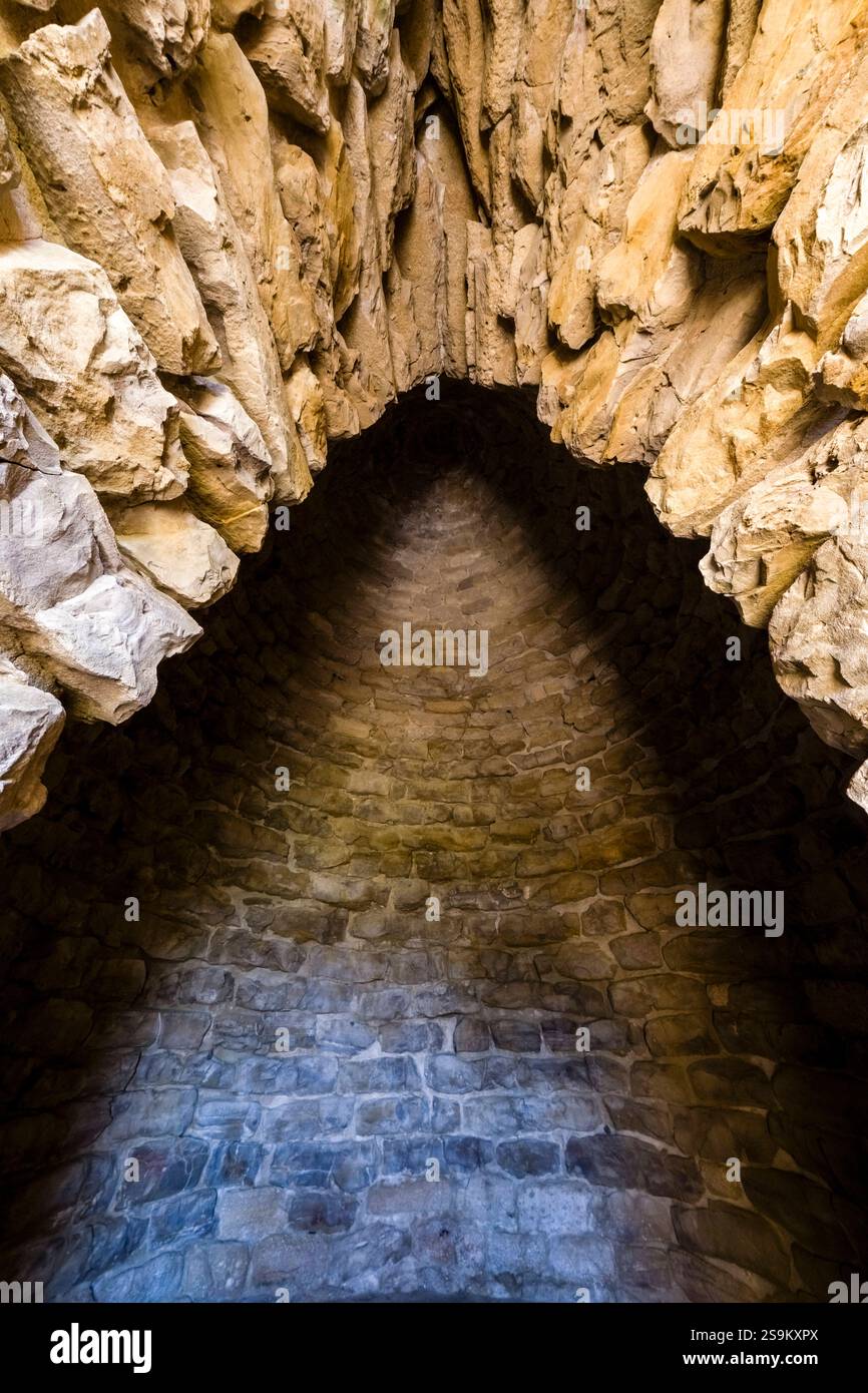 Inside the ruins of the central building of the Nuraghe Is Paras ...