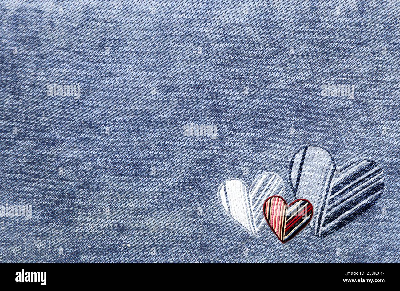 Light blue denim background with felt heart. Horizontal blue color ...