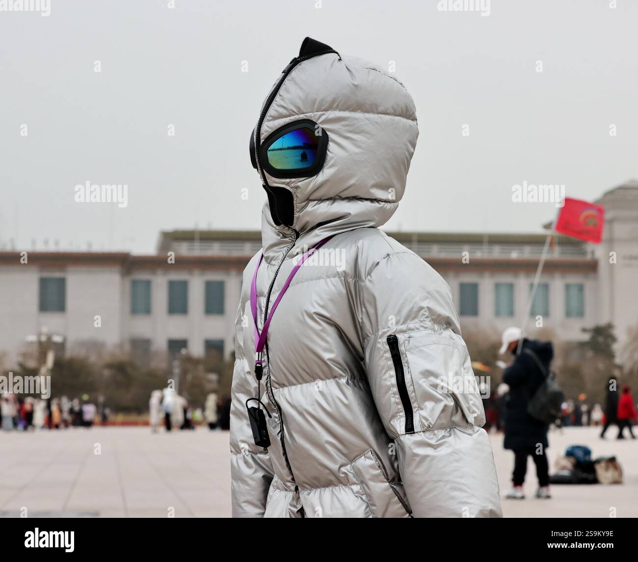 Tourists visit the Tiananmen Square amid cold air in Beijing, China, 26 ...