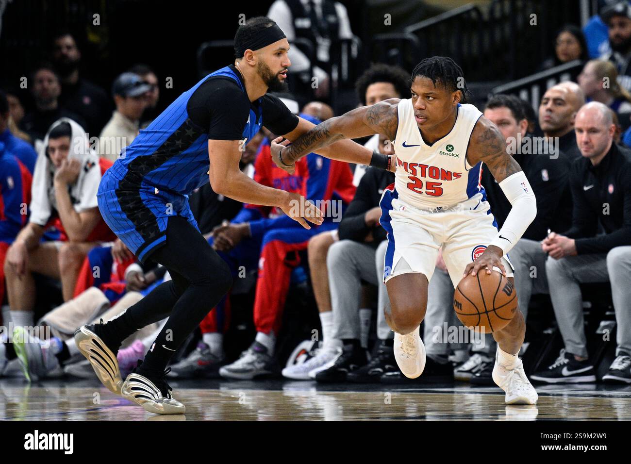 Detroit Pistons guard Marcus Sasser (25) is defended by Orlando Magic ...