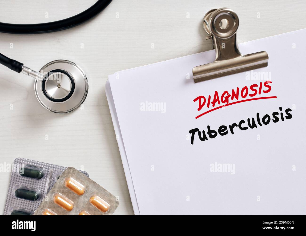 Medical clipboard showing tuberculosis diagnosis, accompanied by ...