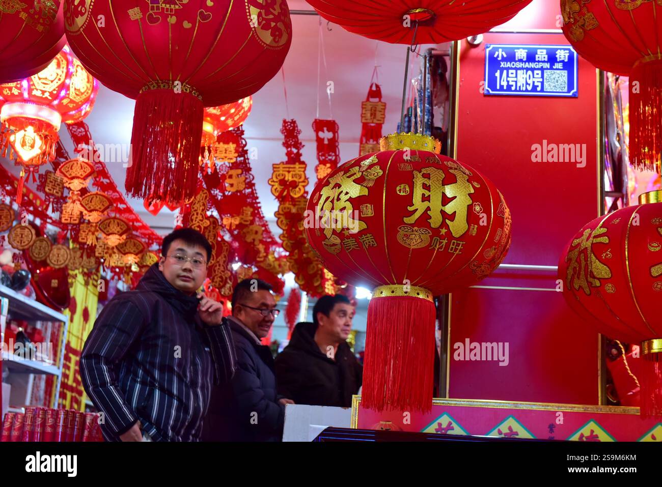 People select Spring Festival decorations at a market in Chongqing ...
