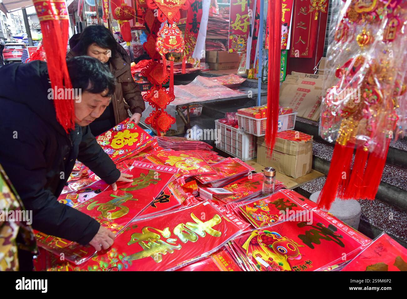 People select Spring Festival decorations at a market in Chongqing ...