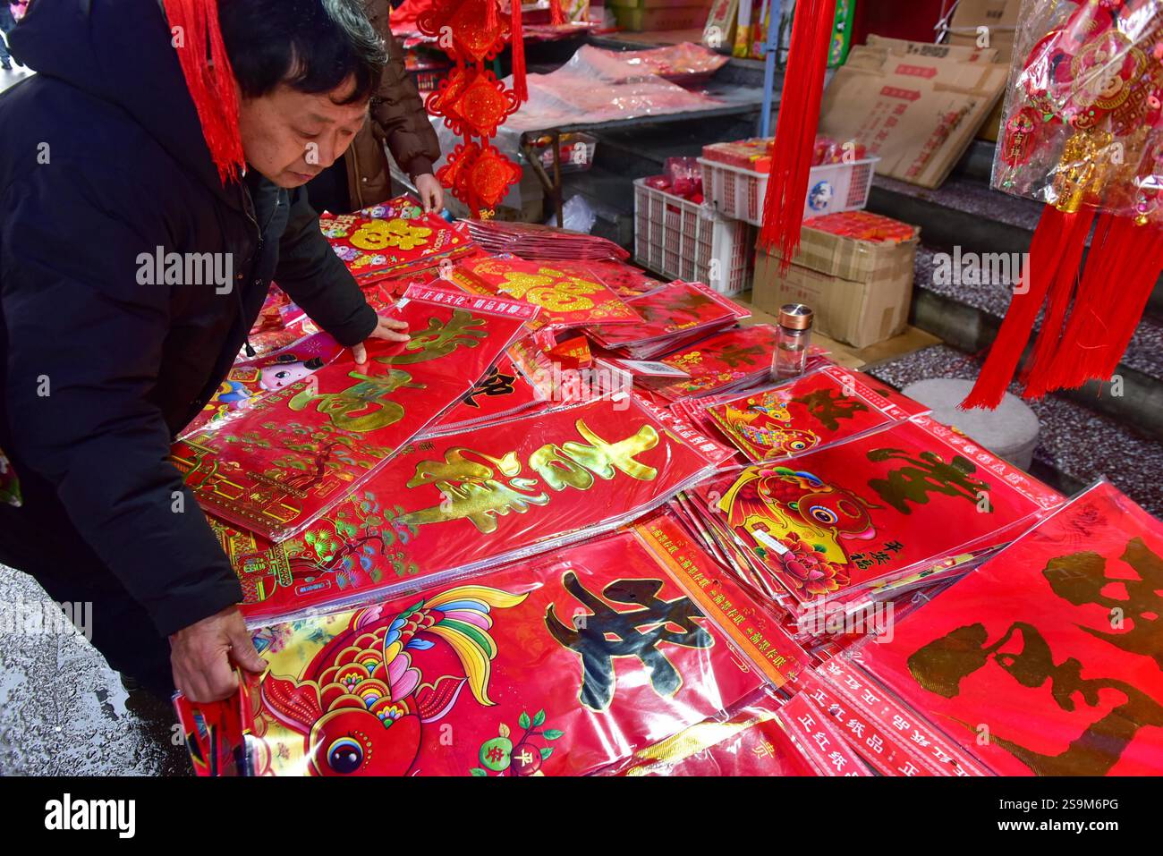 People select Spring Festival decorations at a market in Chongqing ...