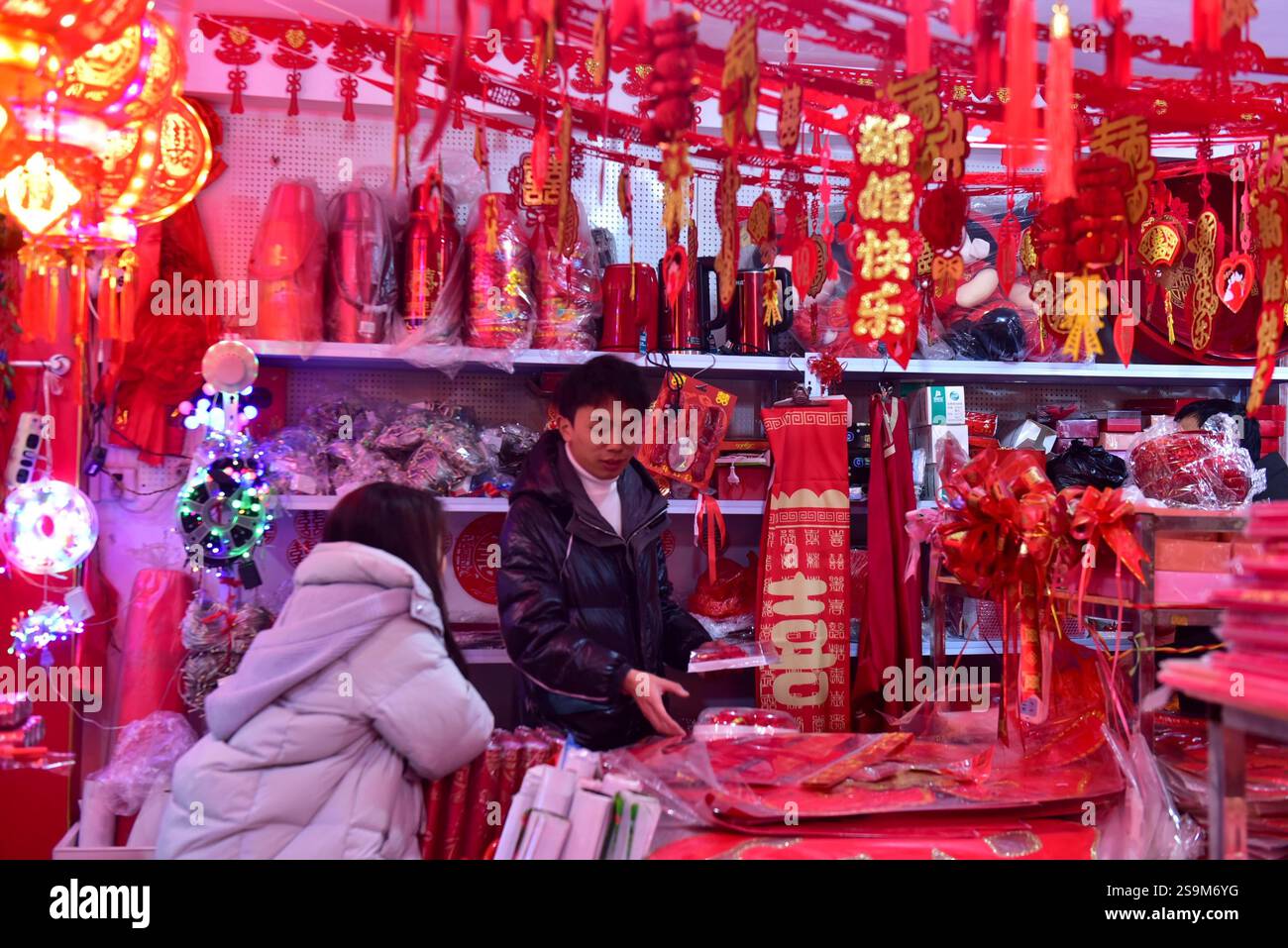 People select Spring Festival decorations at a market in Chongqing ...