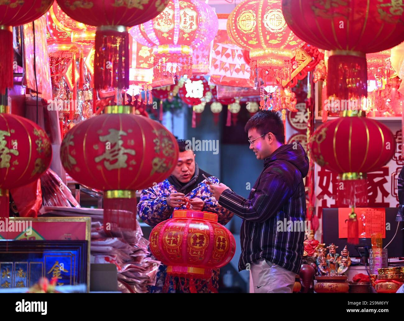 People select Spring Festival decorations at a market in Chongqing ...