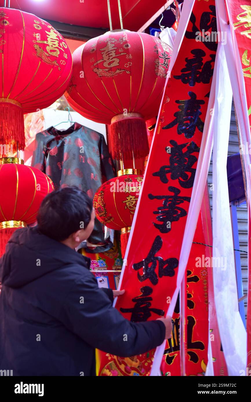 People select Spring Festival decorations at a market in Chongqing ...