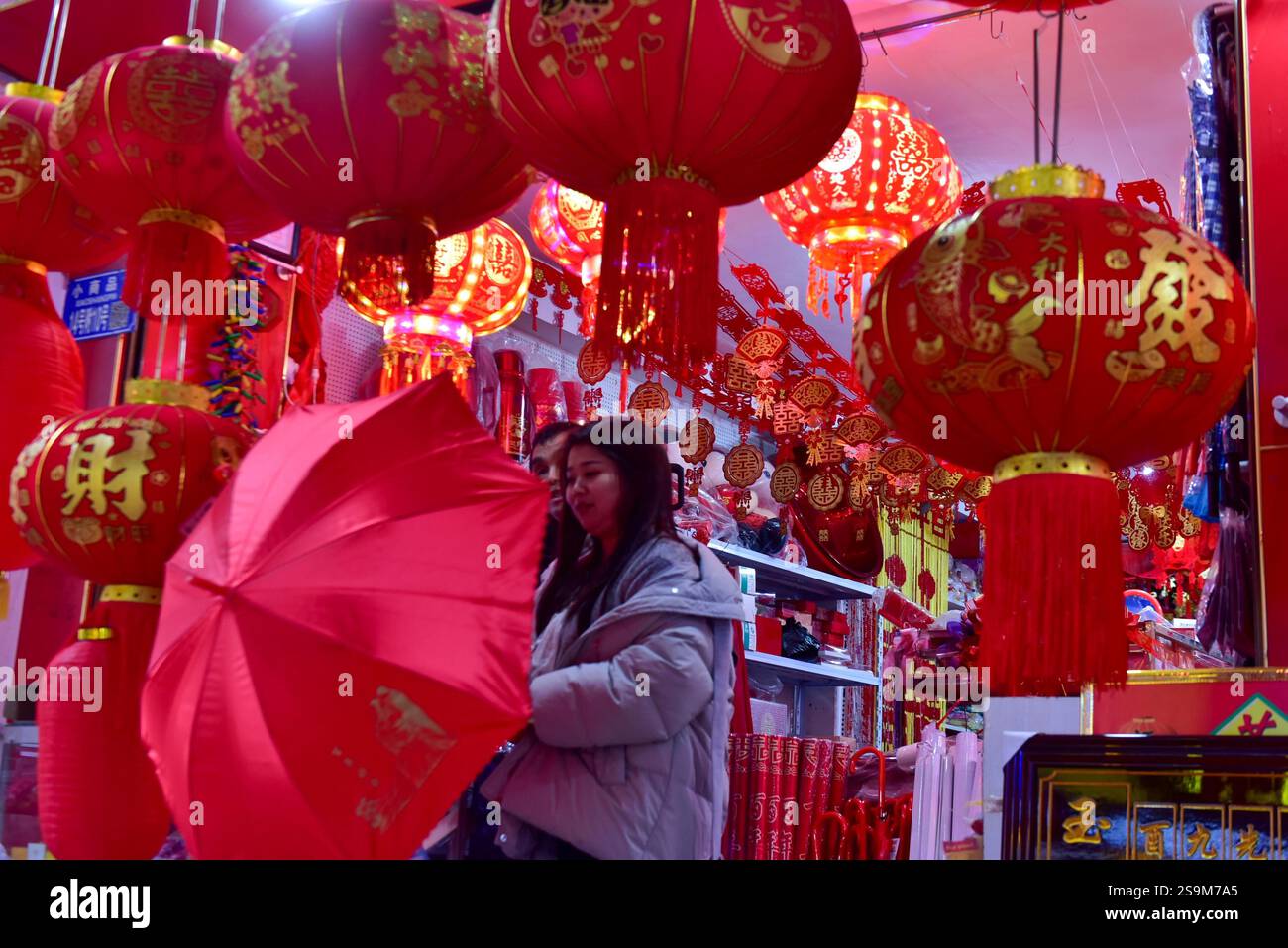People select Spring Festival decorations at a market in Chongqing ...