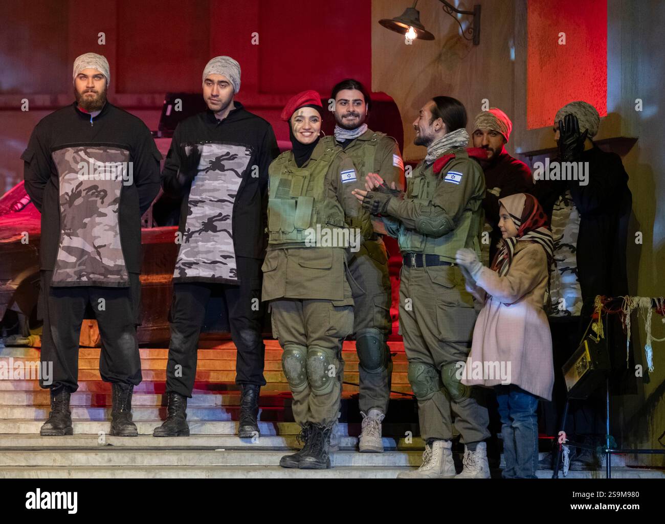 Iranian actor Mohammad Amin Pazoki and actress Shima Jafarzadeh clap and smile after performing ...