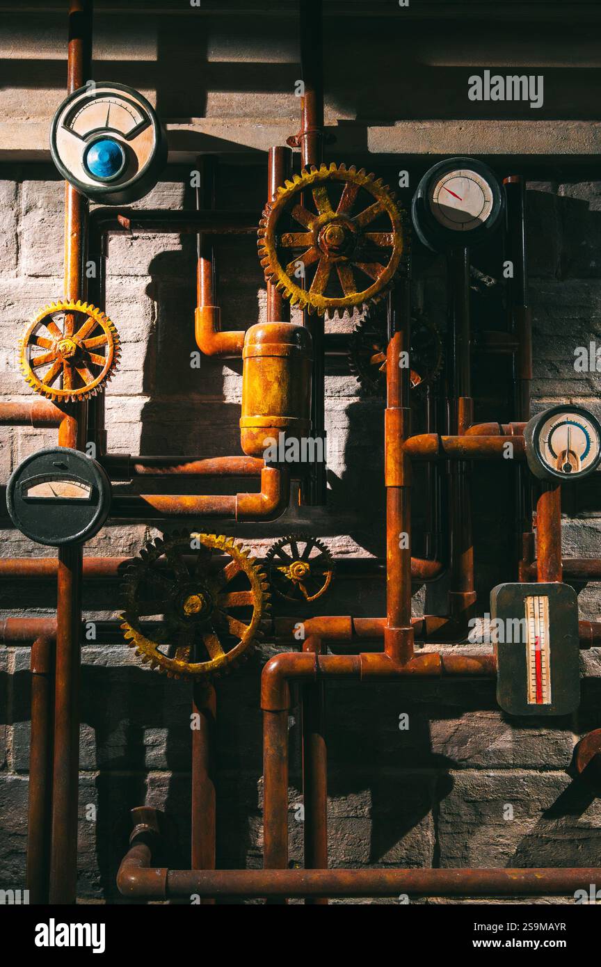 Metal pipes and ventilation systems are installed along the walls of ...