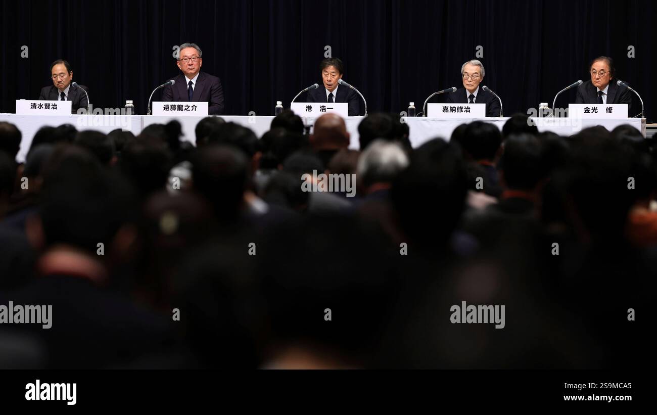 Fuji Television President Koichi Minato (C) and Chairman Shuji Kano ...