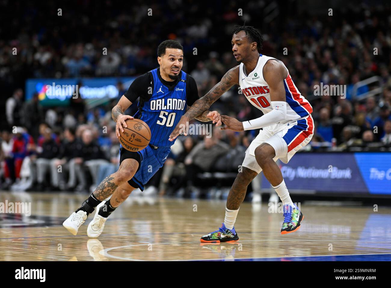 Orlando Magic guard Cole Anthony (50) is defended by Detroit Pistons ...