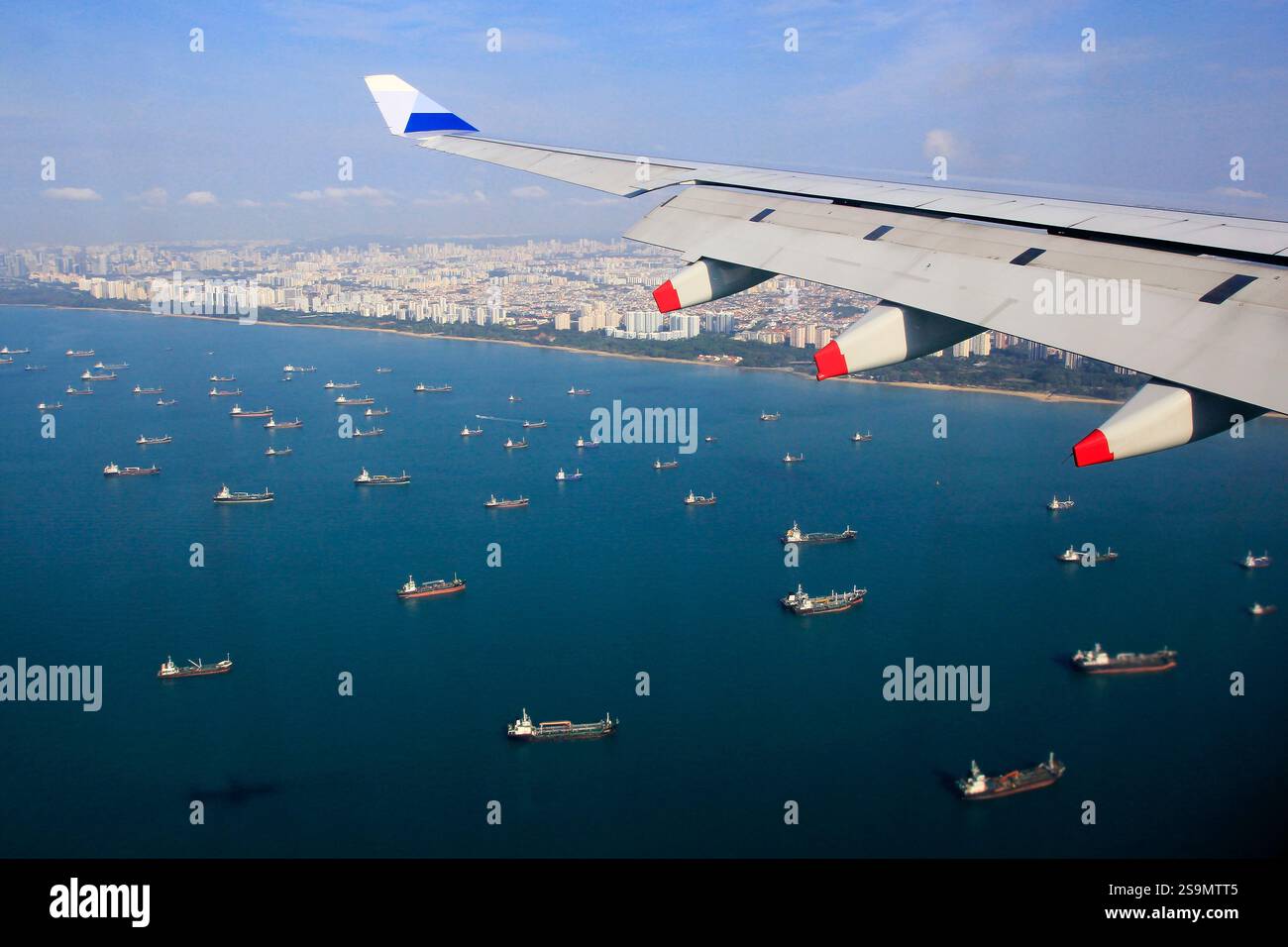 Views of dense rows of boats on the waters of Singapore photographed ...