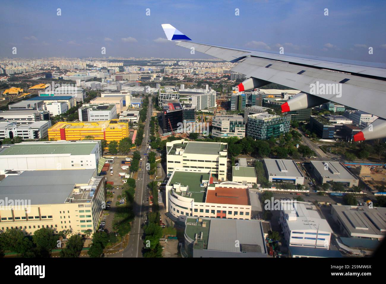 Singapore's bustling commercial, office and apartment center building ...