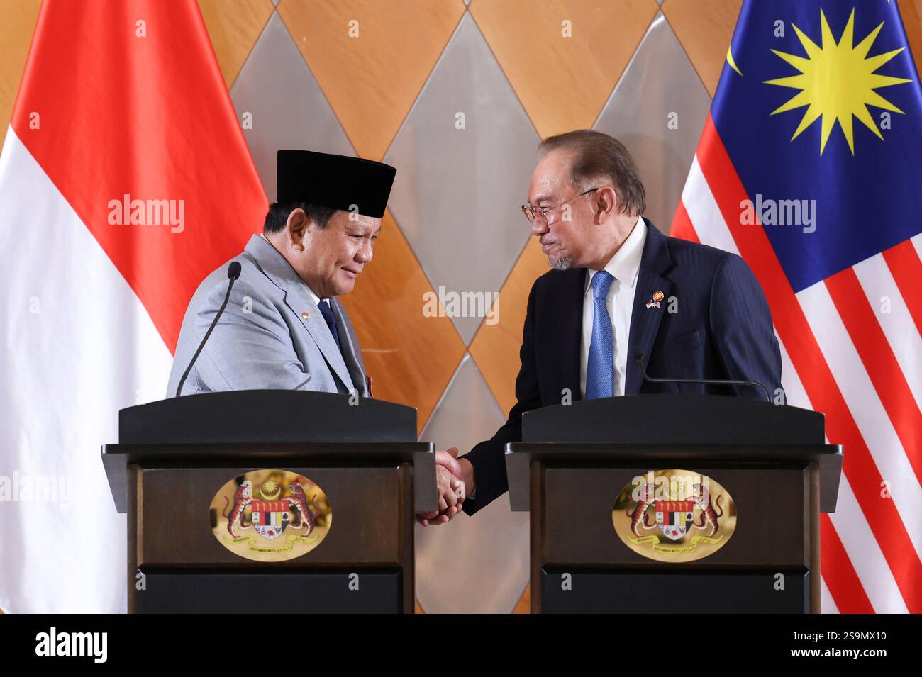 Indonesian President Prabowo Subianto, left, and Malaysian Prime ...