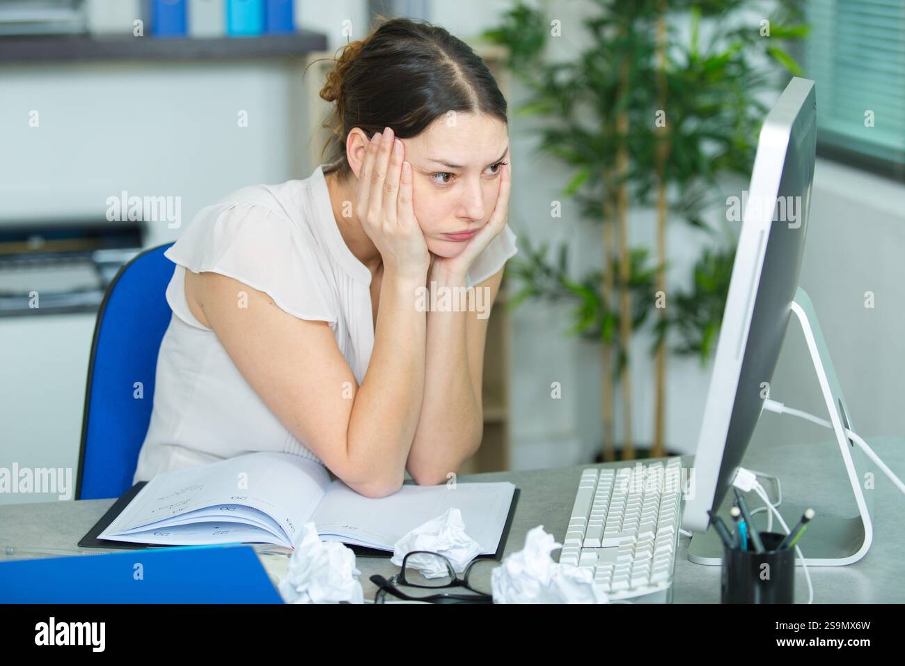 female worker and gesture of failure Stock Photo - Alamy