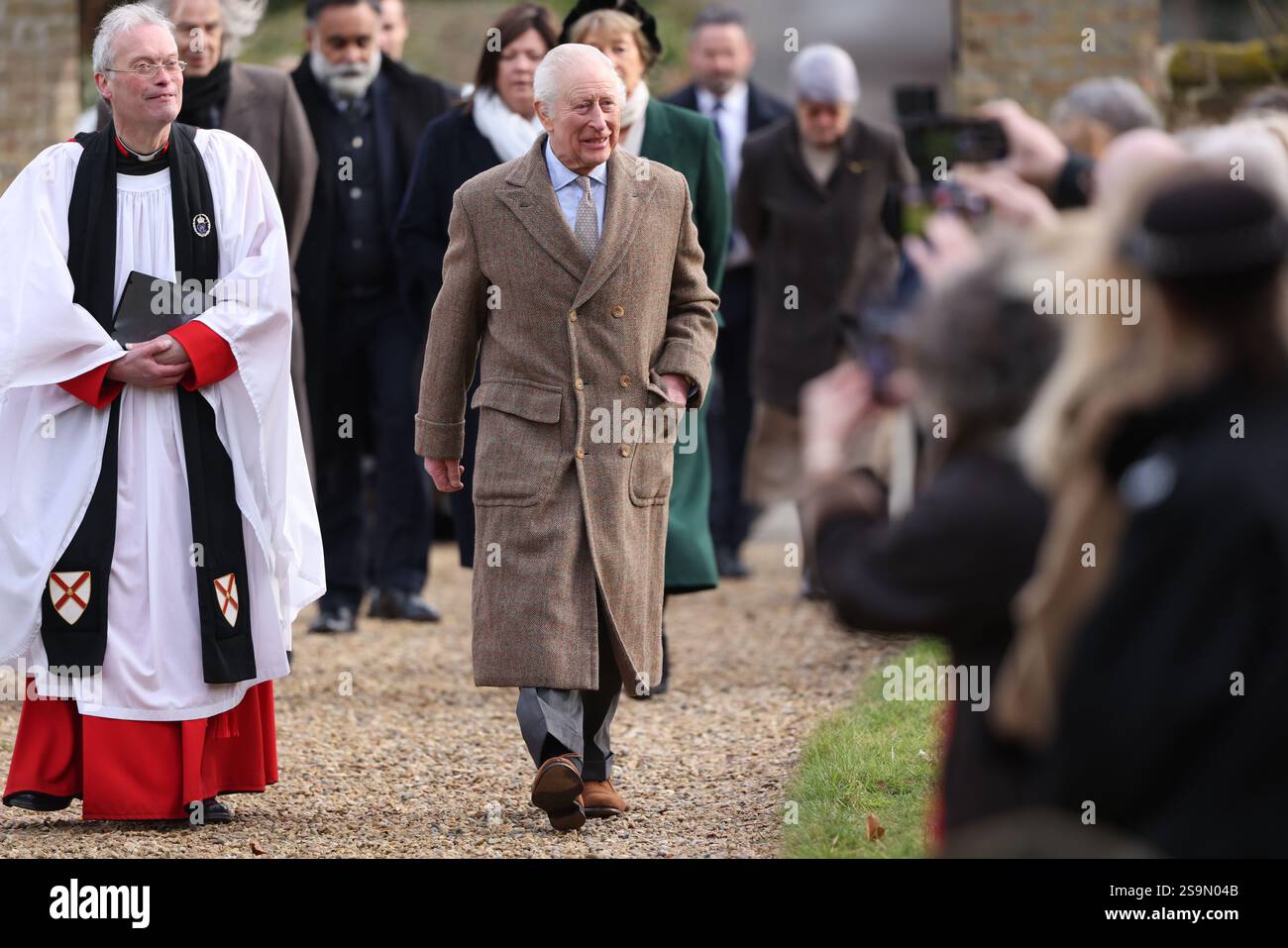 Flitcham, UK. 26th Jan, 2025. King Charles III attends the Sunday ...