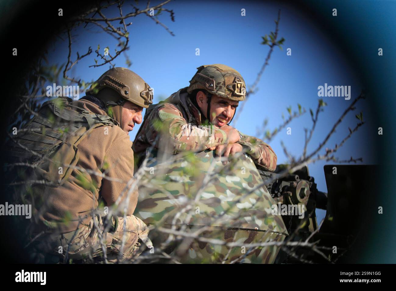 Lebanese soldiers are seen from the window of an U.N peacekeeper ...