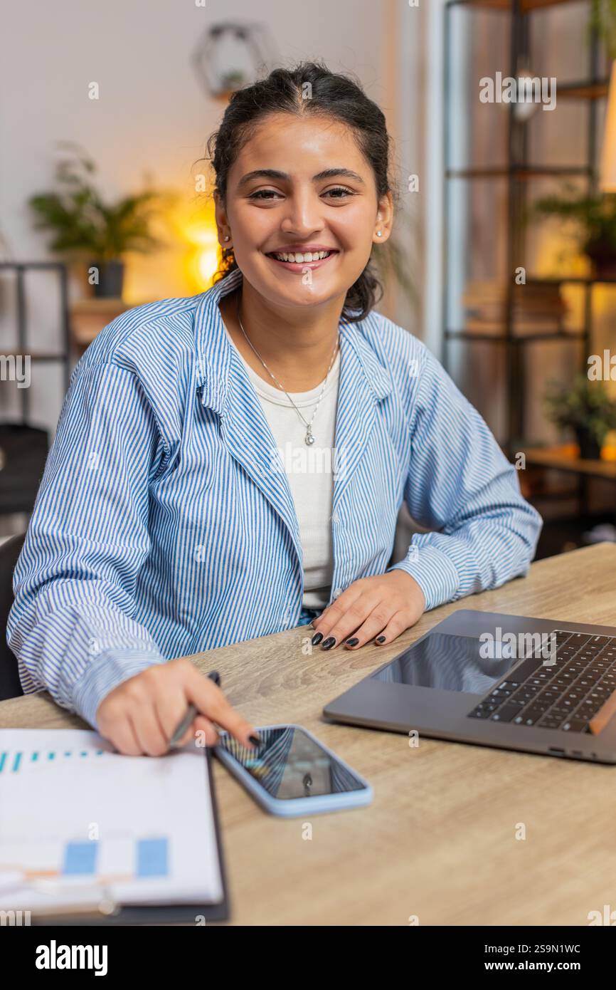 Indian freelancer accountant working with financial graph documents ...