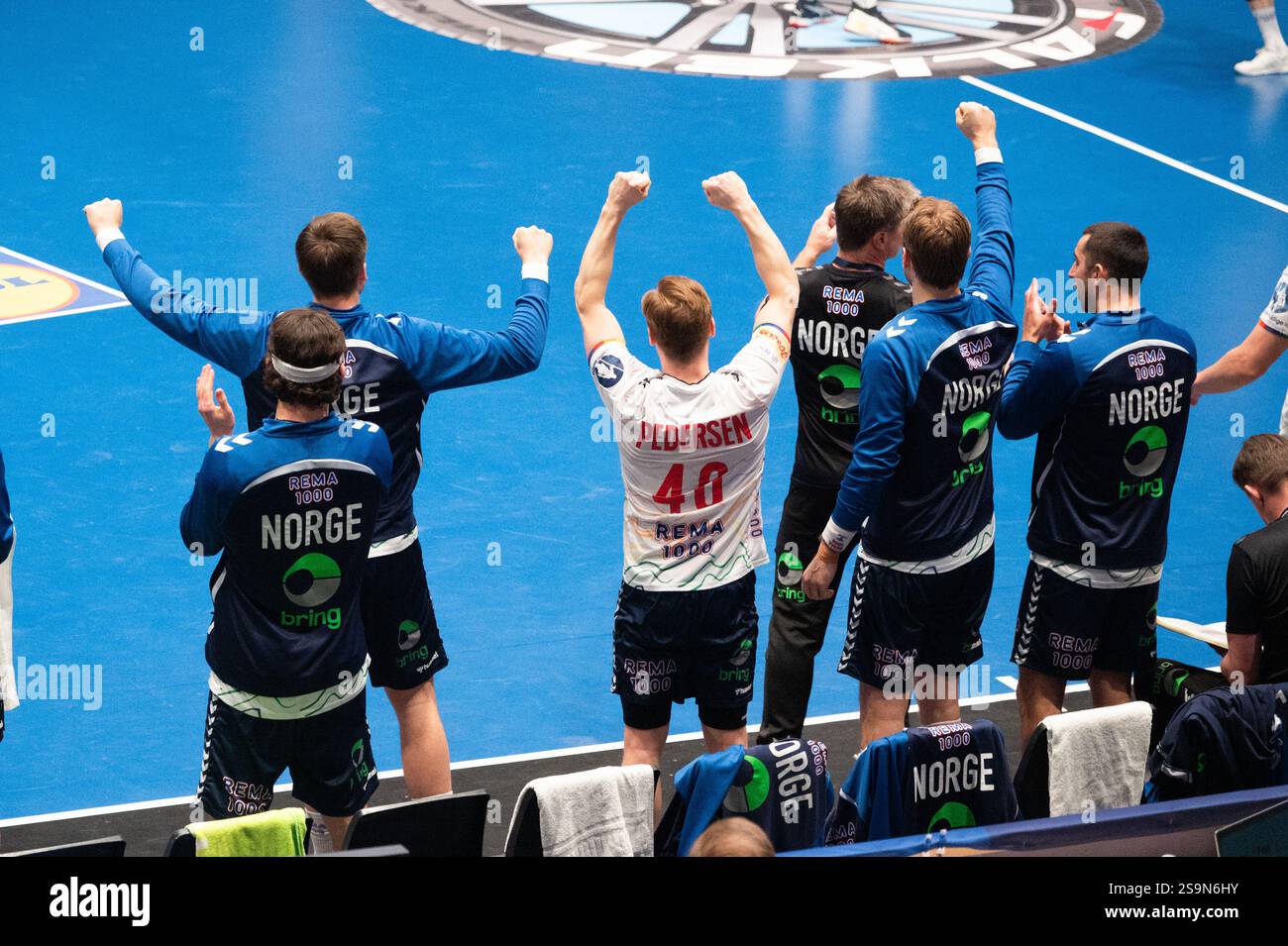 Oslo, Norway. 26th Jan, 2025. August Pedersen (40) and The players of ...
