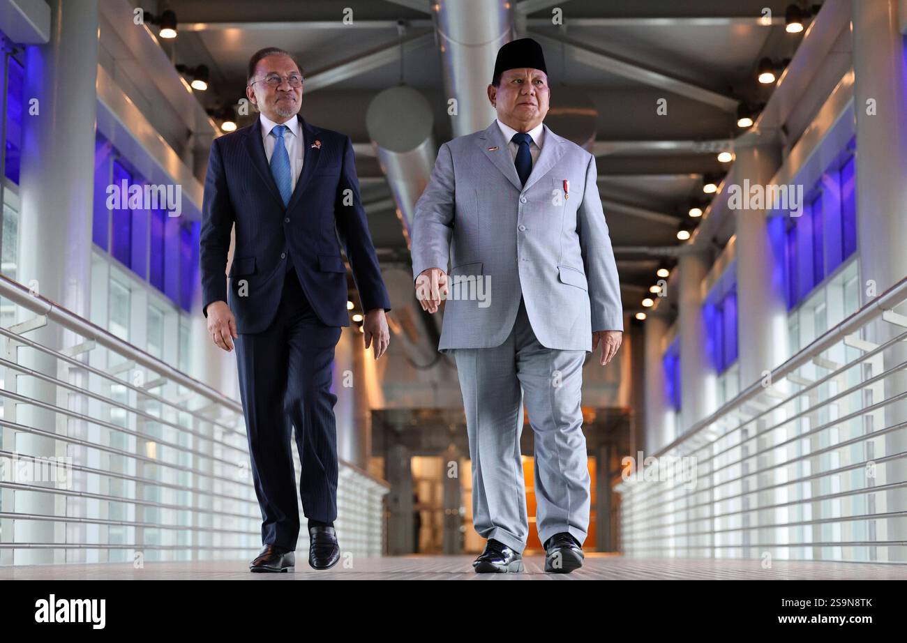 Indonesian President Prabowo Subianto, right and his Malaysian ...