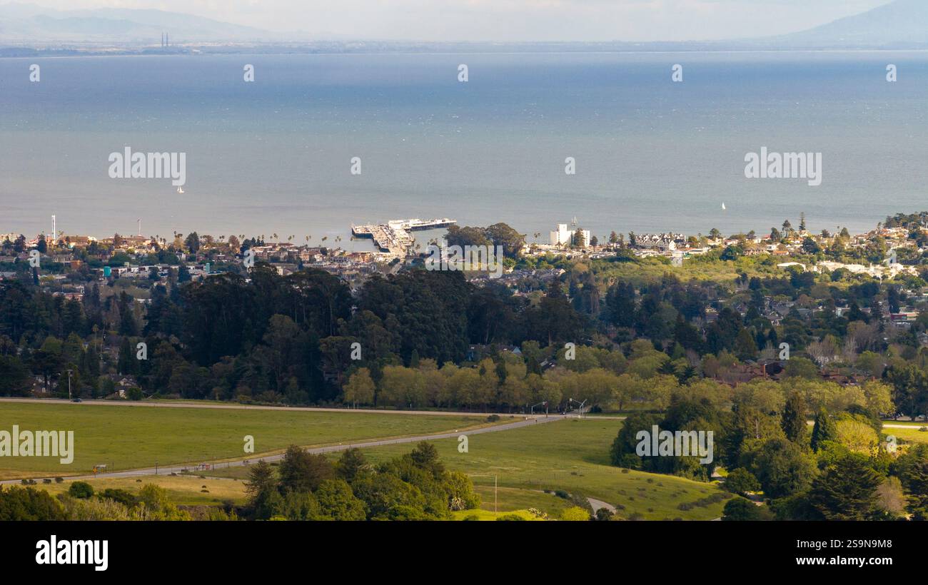 Aerial view of Santa Cruz pier and Monterey Bay from drone over campus ...