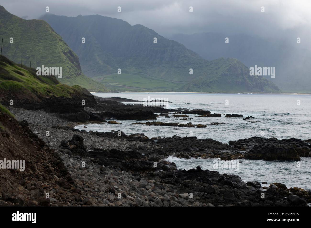 Storm approaching in distance along west side Hawaii coast Stock Photo ...