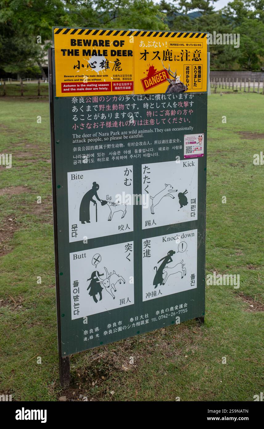 Sign Warning of Male Deer being dangerous in Nara Park Nara Japan Stock ...