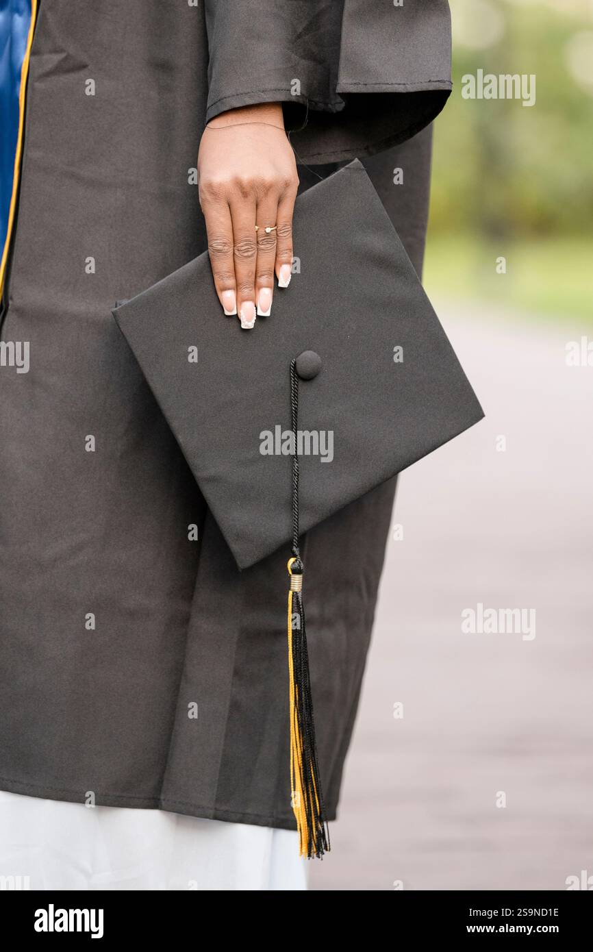 Girl holding degree hi-res stock photography and images - Alamy