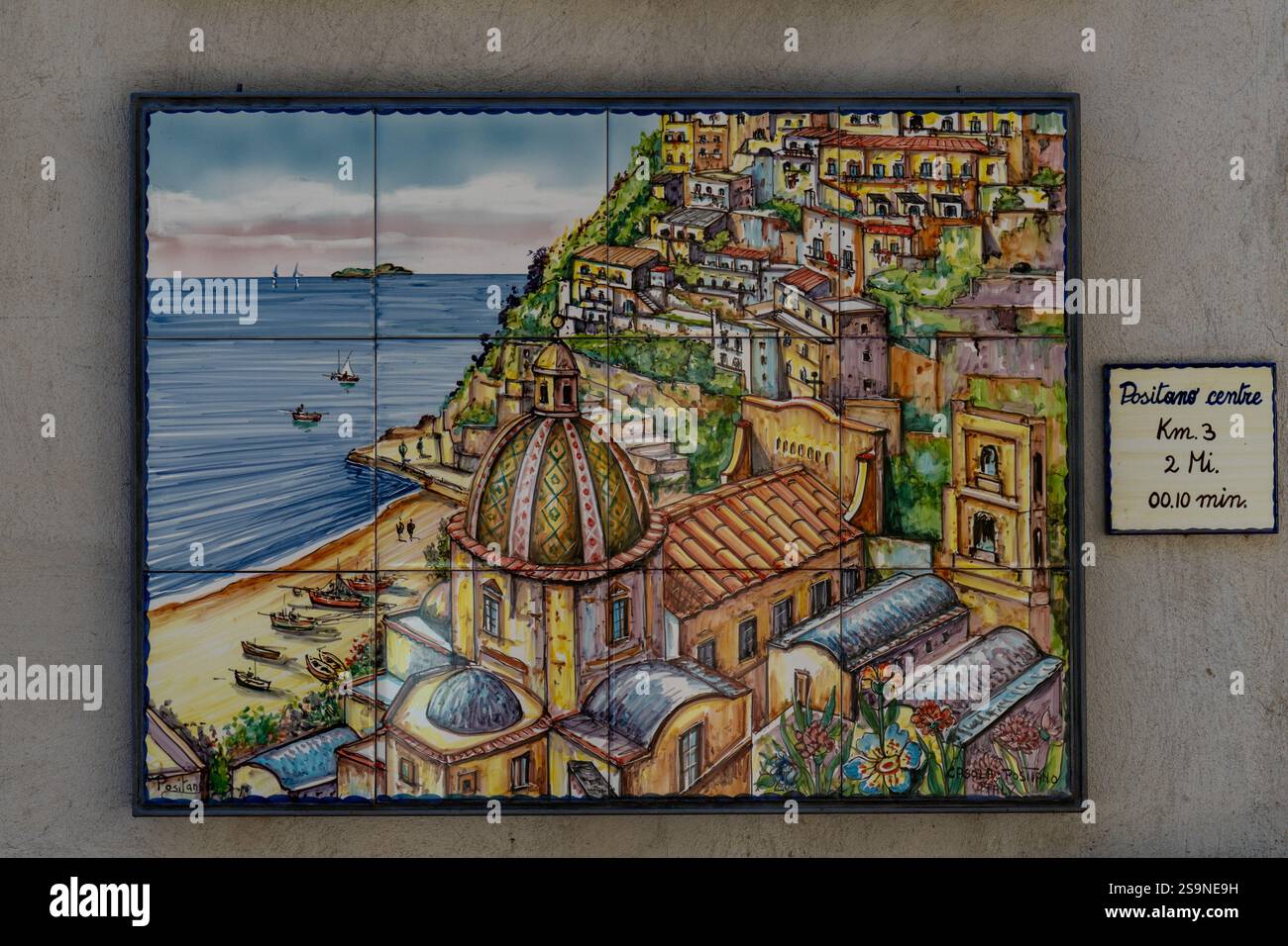 A colorful ceramic tile picture of Positano at a ceramic shop on the ...