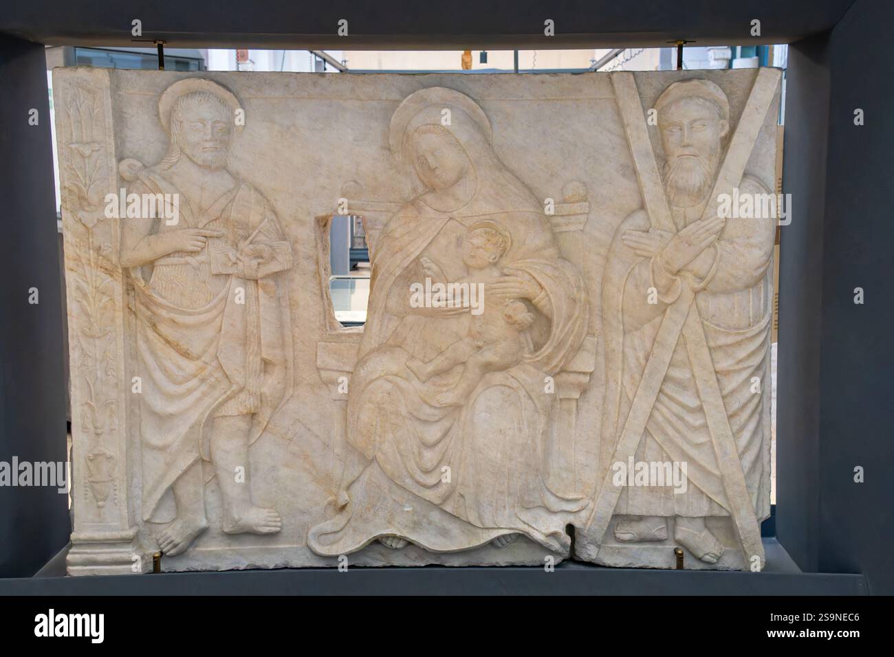 A marble bas relief of the Virgin and Child in the Diocesan Museum of ...