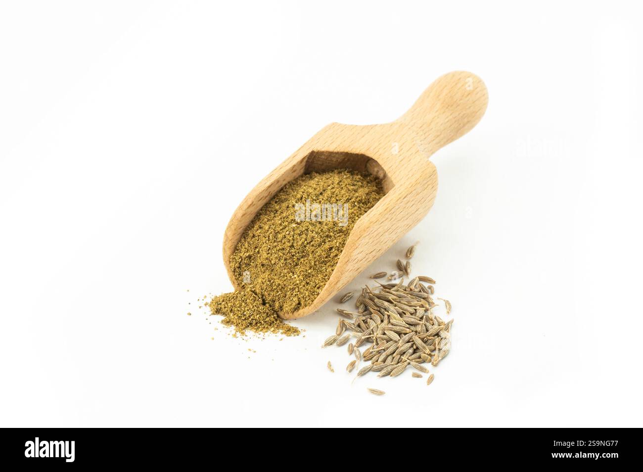 Dry cumin seeds with ground caraway powder isolated on white background ...