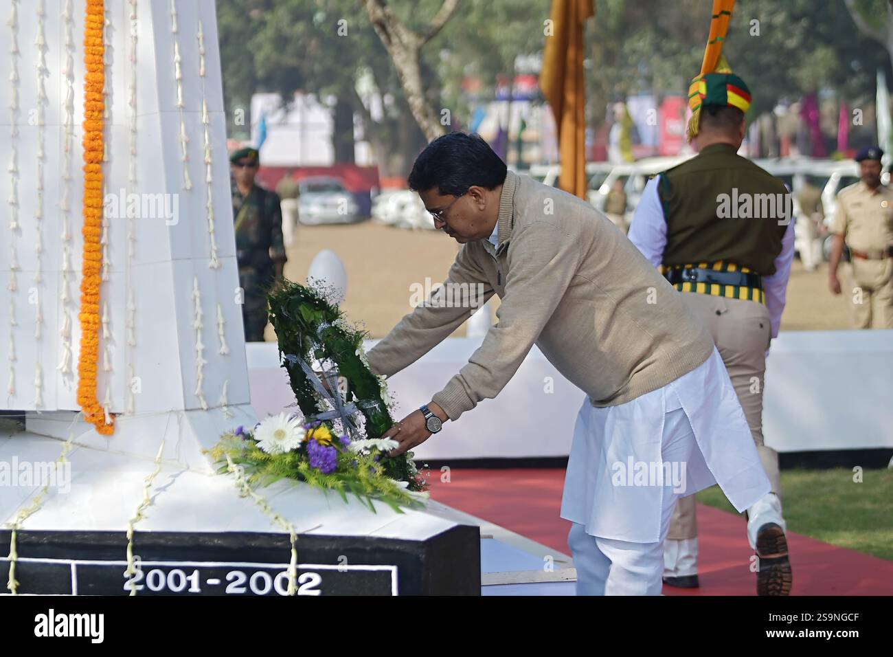 Tripura Chief Minister Dr. Prof. Manik Saha is giving a floral tribute ...