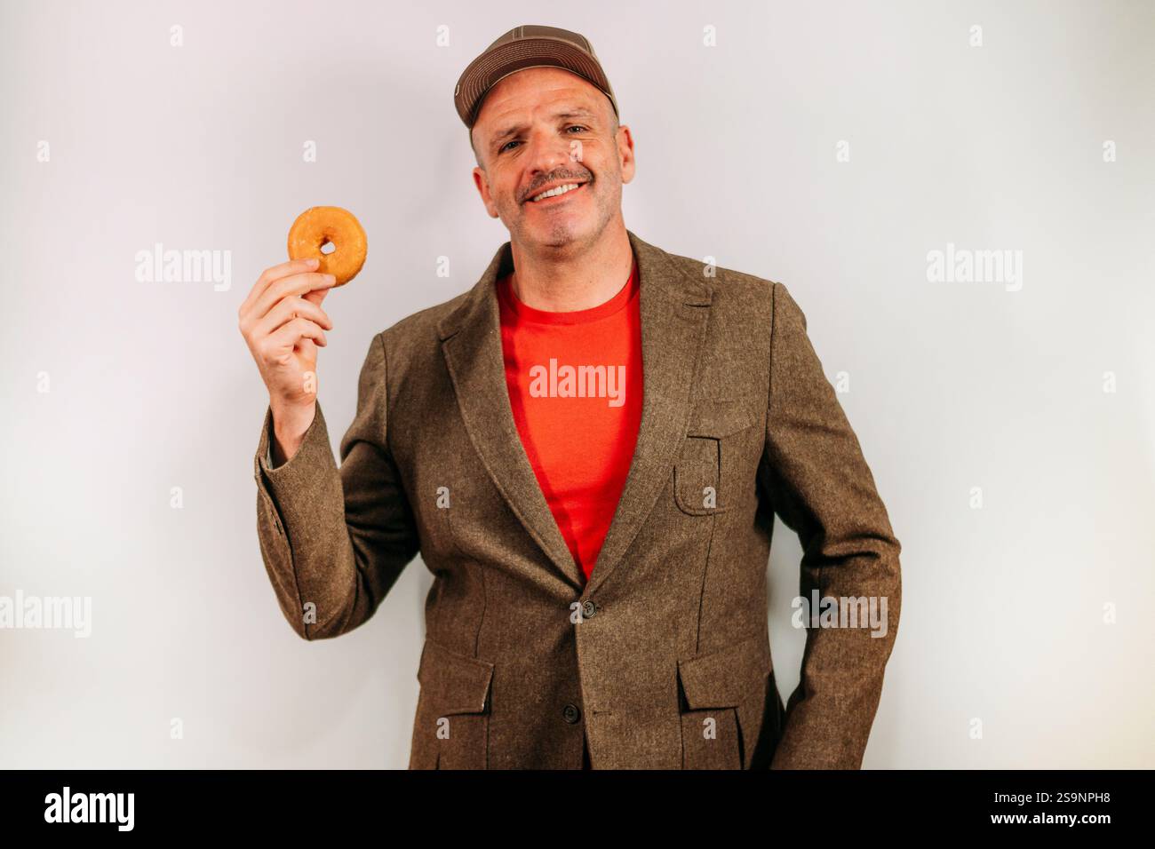 Joyful man holding tasty hi-res stock photography and images - Alamy