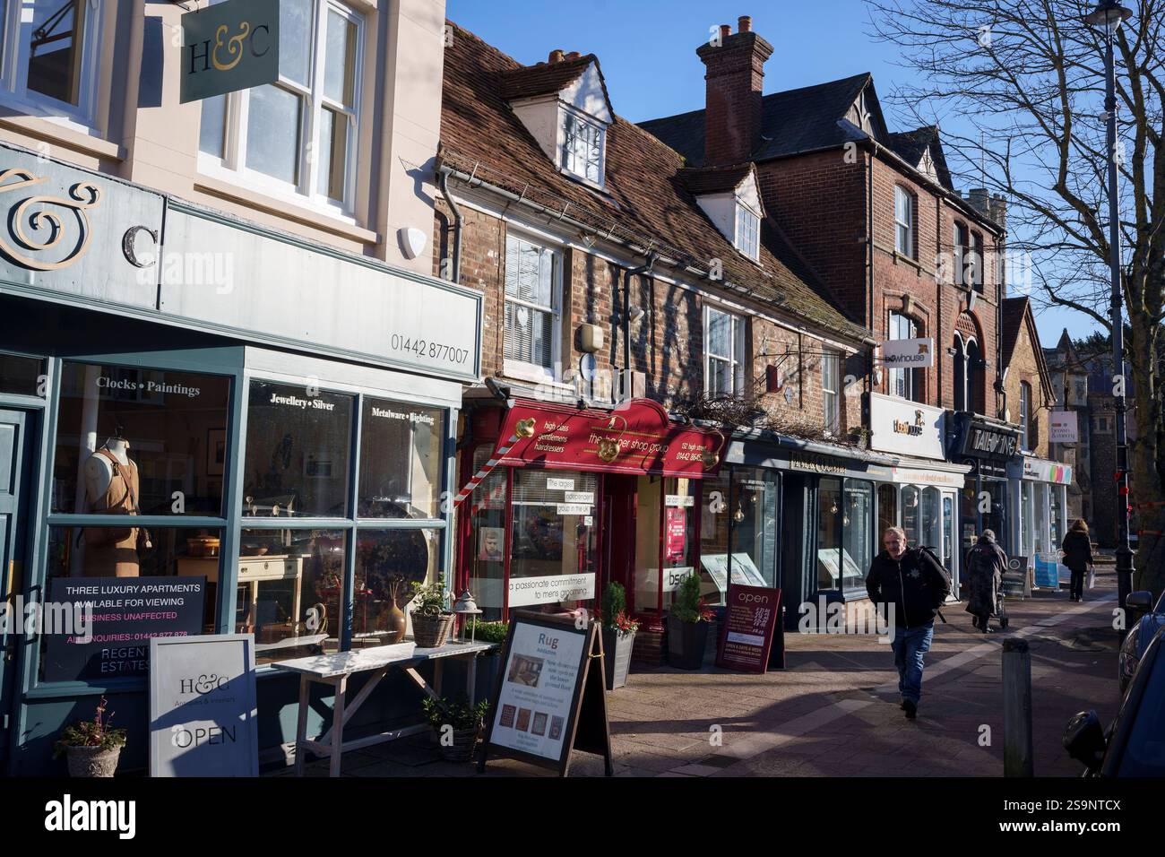 Shoppers walk past independent high street shops, on 25th January 2025 ...