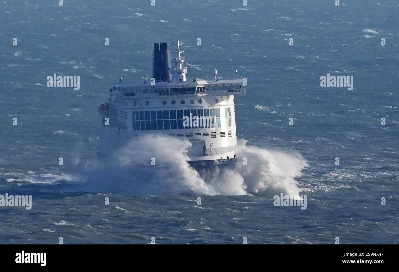 A ferry arrives at the Port of Dover in Kent during rough seas. Stormy ...