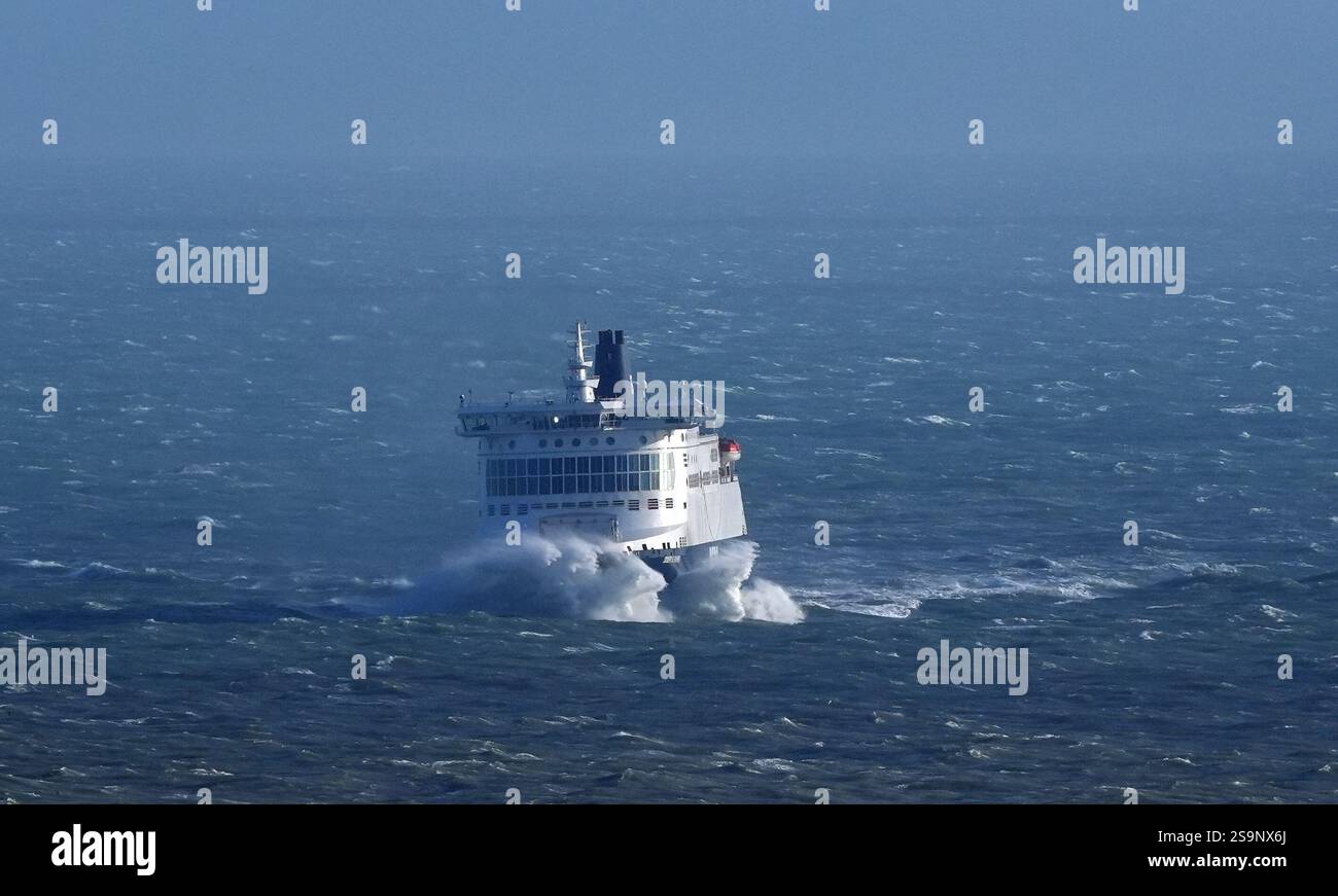 A ferry arrives at the Port of Dover in Kent during rough seas. Stormy ...