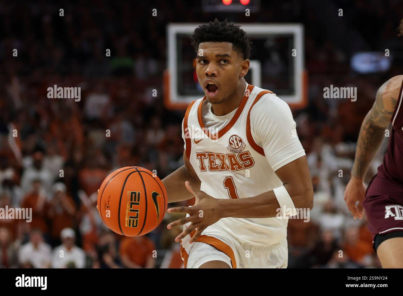 AUSTIN, TX - JANUARY 25: Texas Longhorns guard Julian Larry (1) drives ...