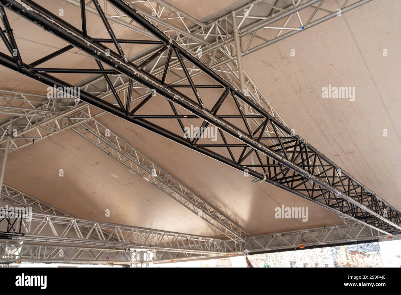 View of a metal truss roof, showcasing its structural design and ...