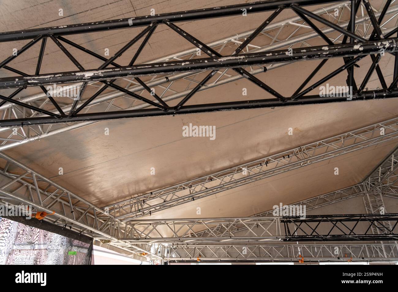 View of a metal truss roof, showcasing its structural design and ...