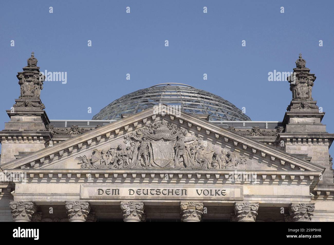 Facade of the Reichstag building with inscription and dome in Berlin ...