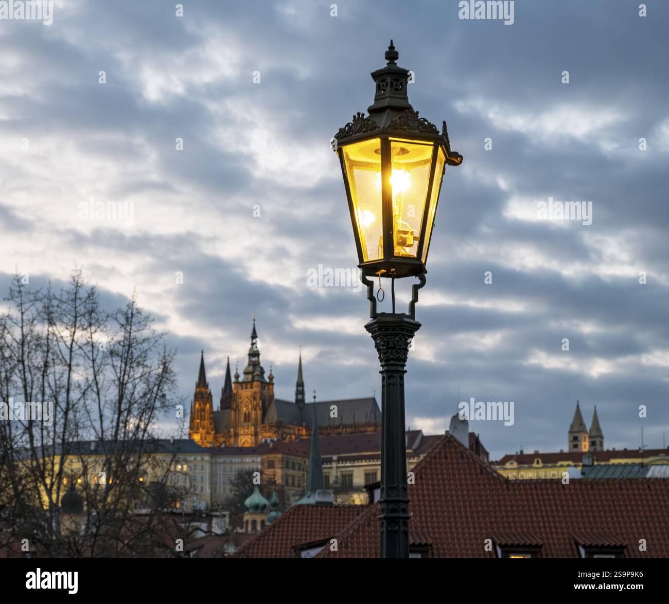Lit-up street light and Prague Castle, Praha, Czech Republic, Europe ...