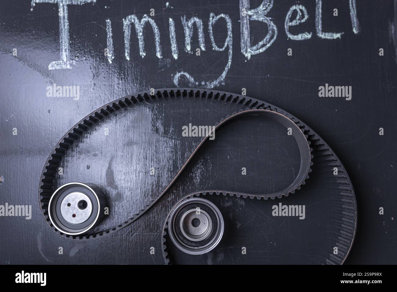 Timing belt on a blackboard with chalk writing and gears Stock Photo ...