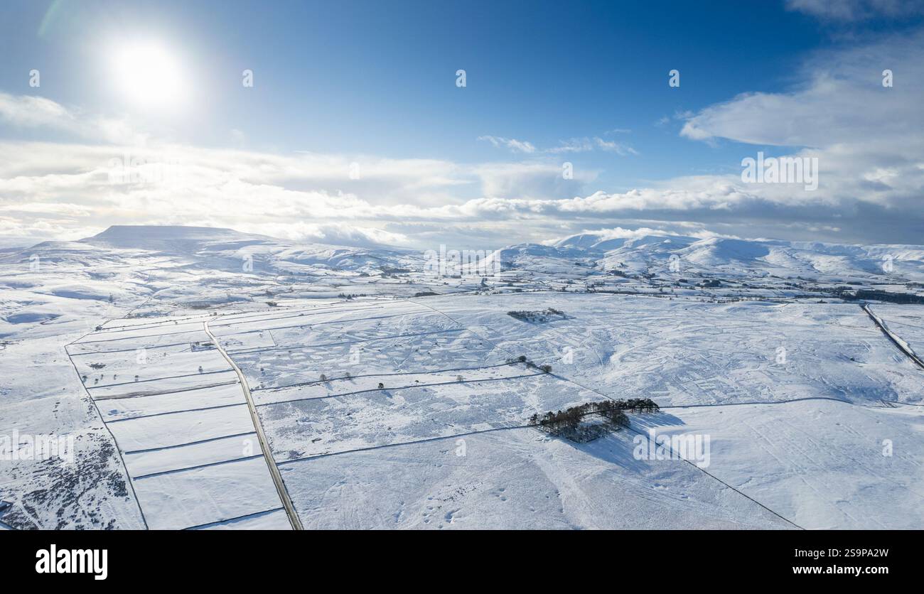 a snowy scene of farm land near kirkby stephen on the edge of the ...